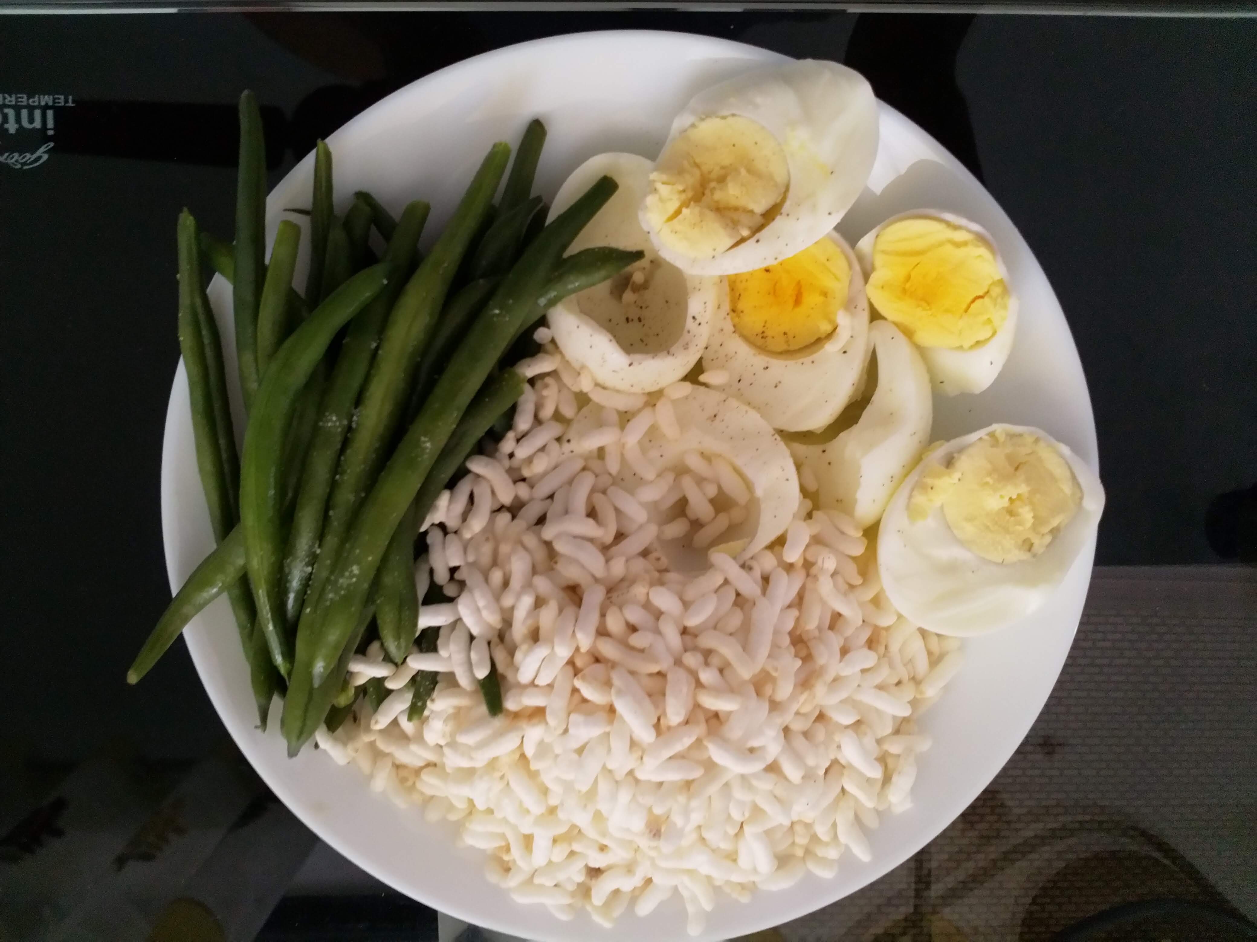 Boiled Eggs Rice Puffs And Steamed Okras